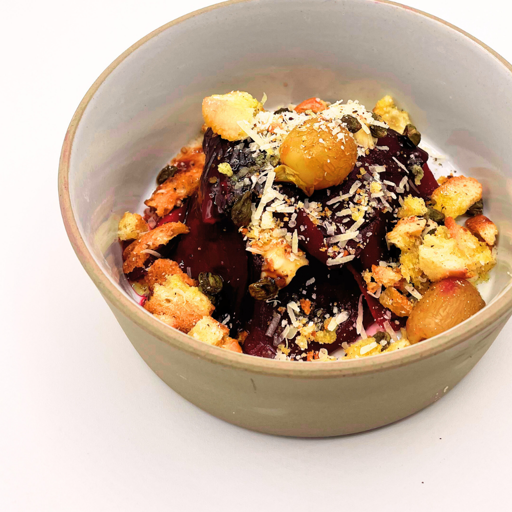 Beet, pumpkin and goat cheese salad - El Tenedor Cafe and Bar